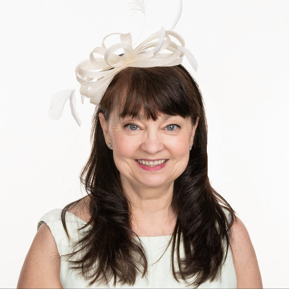 Ivory Fascinator with Loops & Feathers – Hats & Tiaras